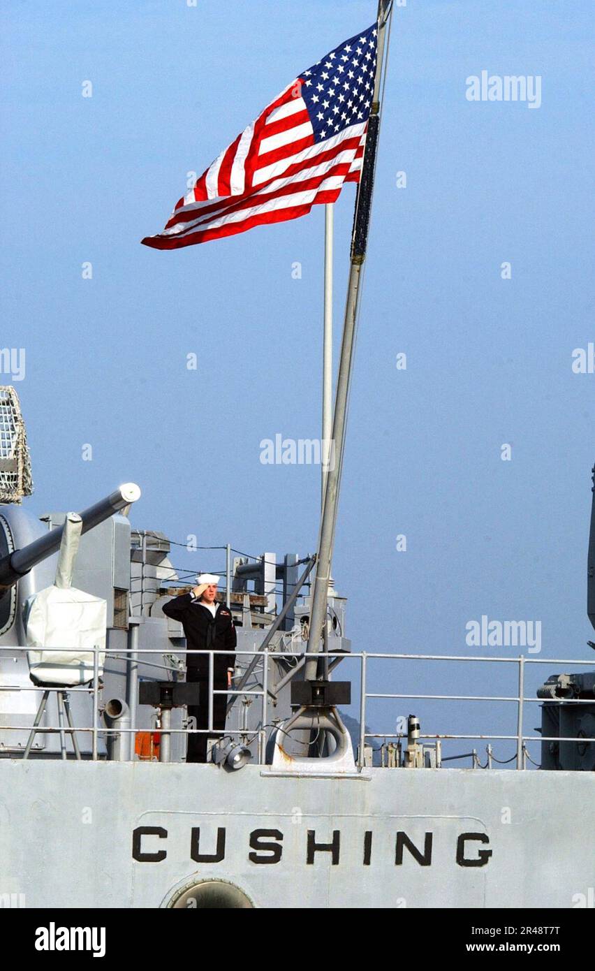 US Navy Morning colors aboard USS Cushing Stock Photo - Alamy
