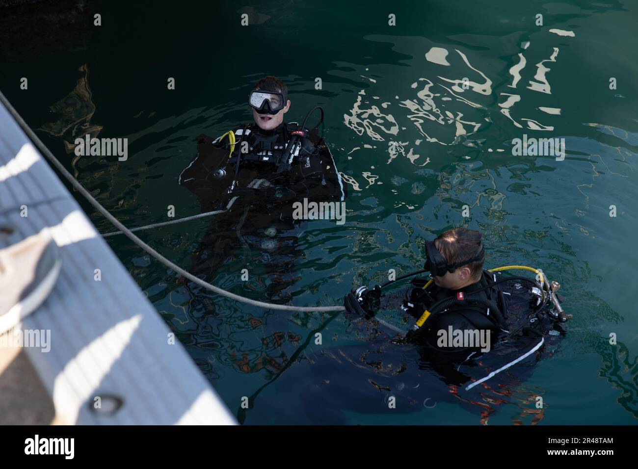 U.S. Army Second Class Divers with the 511th Engineer Dive Detachment ...