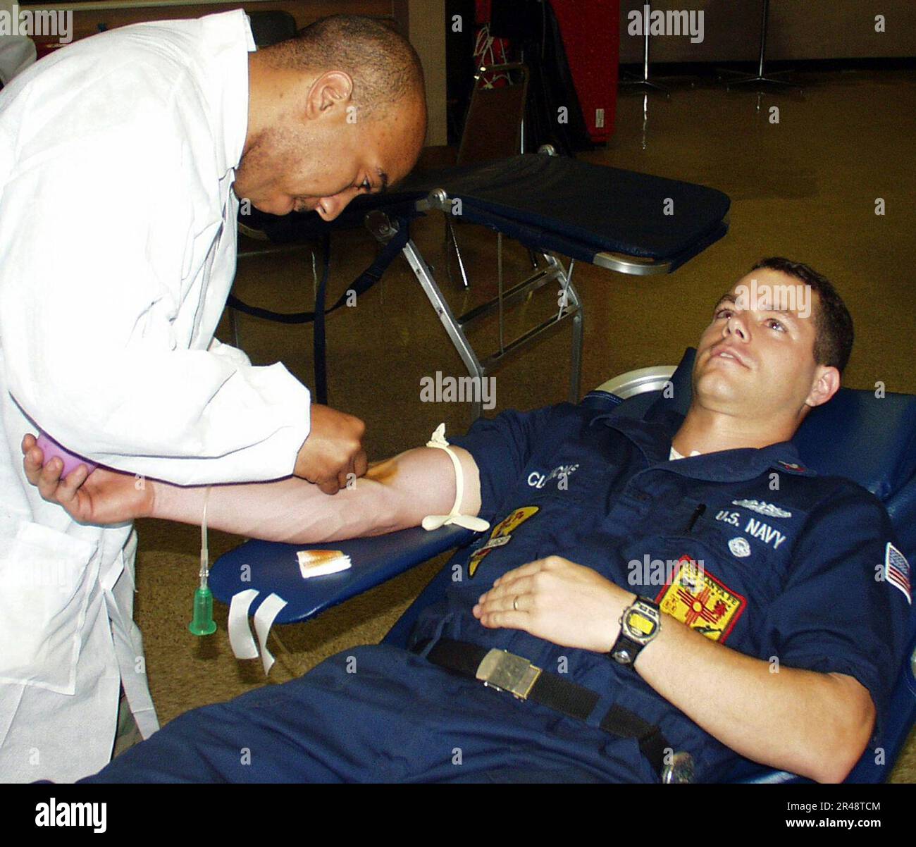 US Navy giving blood at the blood drive Stock Photo - Alamy