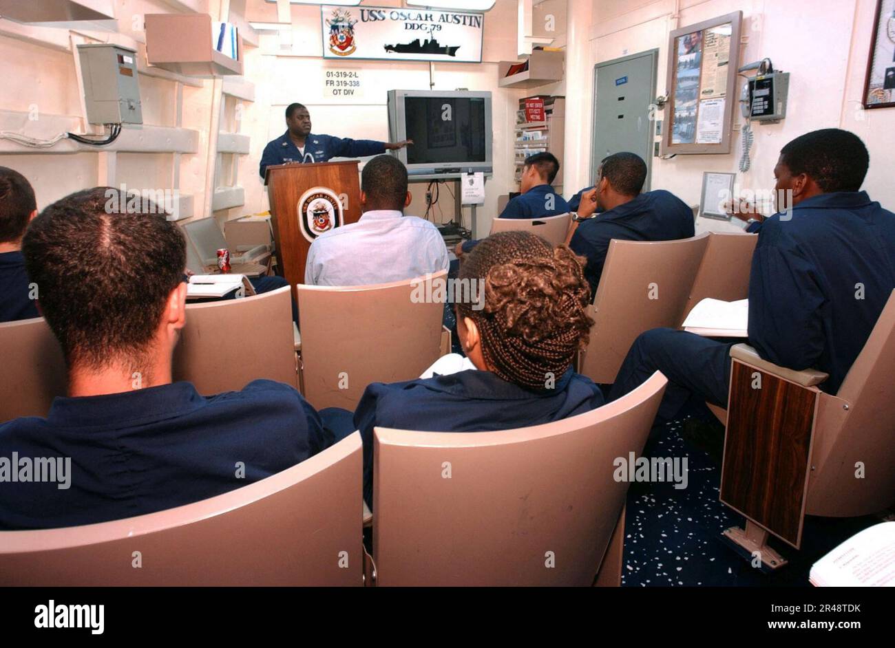 US Navy teaching Petty Officer Indoc aboard USS Oscar Austin Stock ...