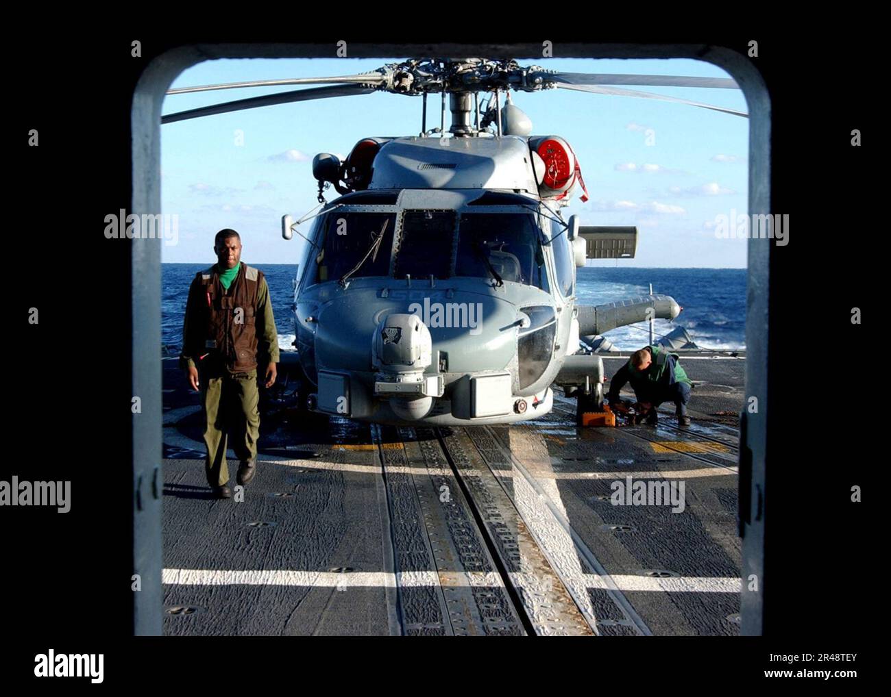 US Navy Crewmembers assigned to Helicopter Anti-Submarine Squadron ...