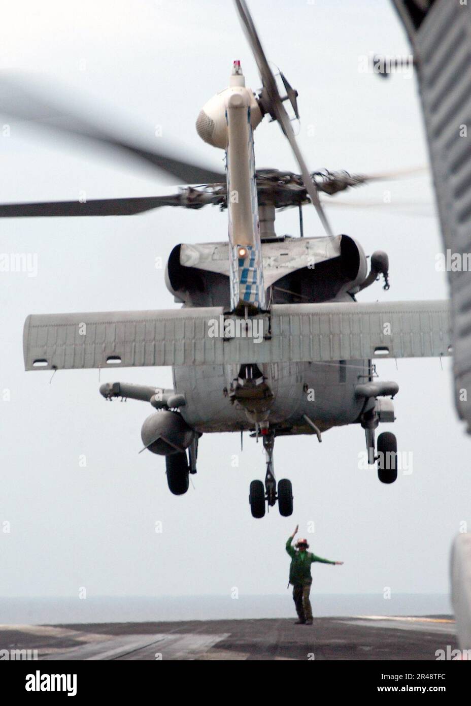 US Navy An SH-60H ''Seahawk'' helicopter lands on the ship's flight ...