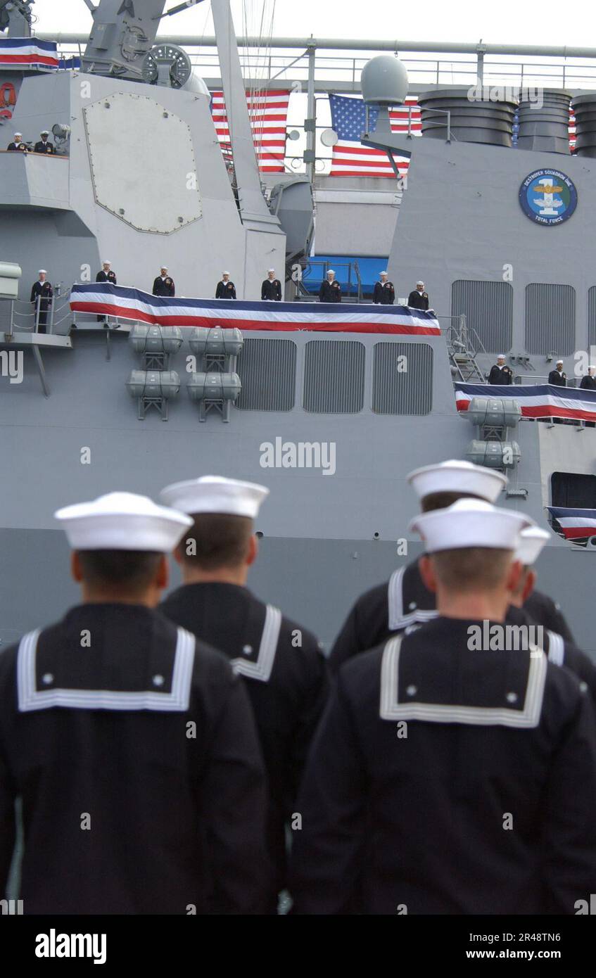 US Navy Sailors assigned to the newly commissioned guided missile ...