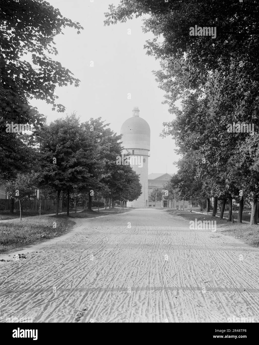 Campus road leading to stone tower, Michigan State Normal College ...