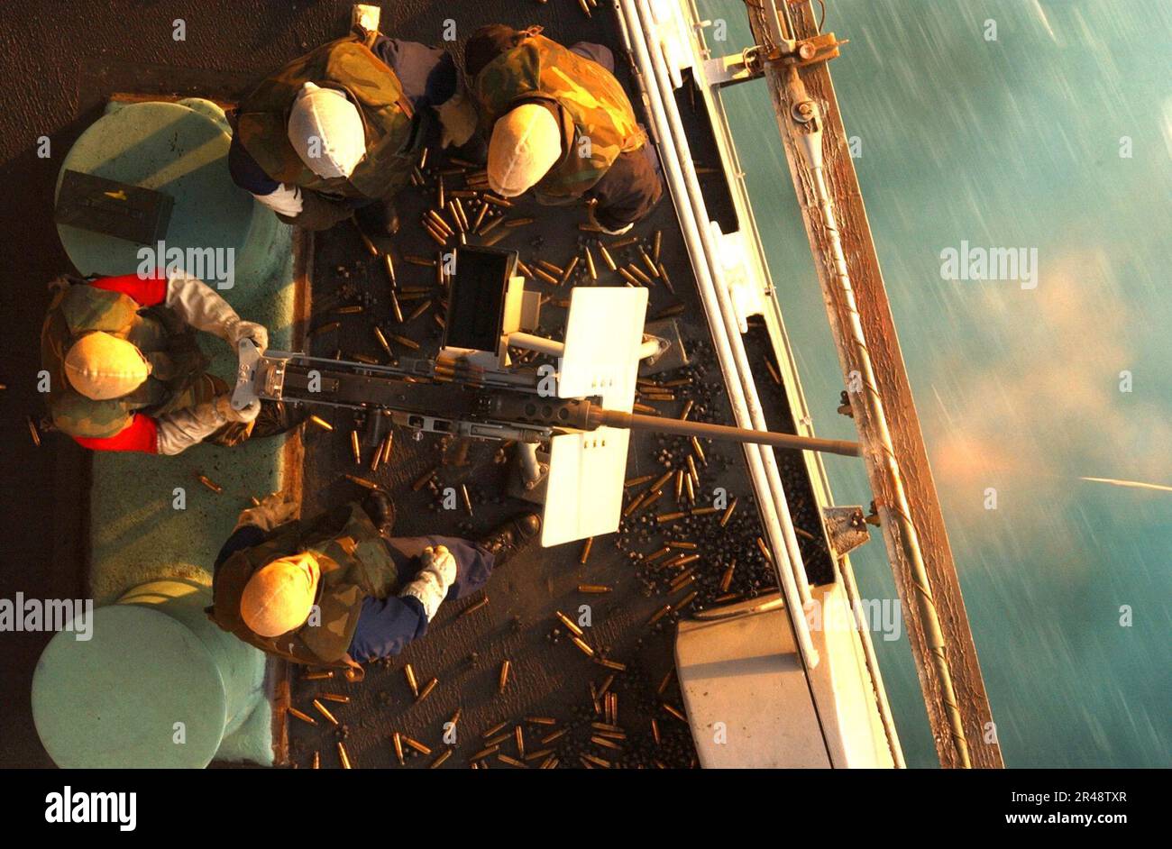 US Navy Aviation Ordnancemen conduct 50-caliber training on the fantail ...