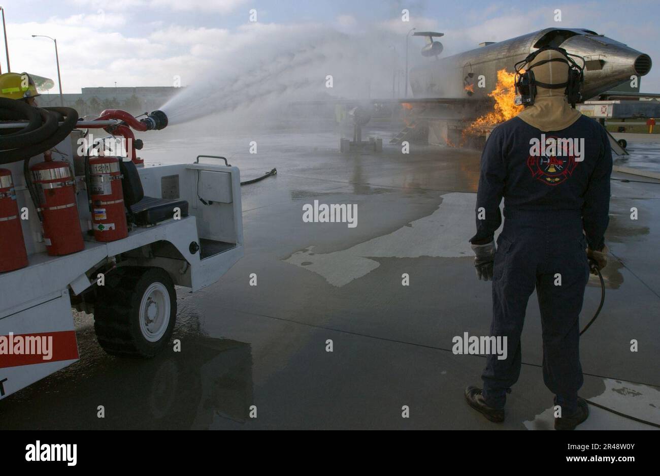 US Navy Members of the training staff demonstrate effective ...