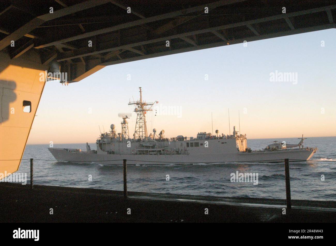 US Navy The elevator opening in the hangar bay frames the guided ...