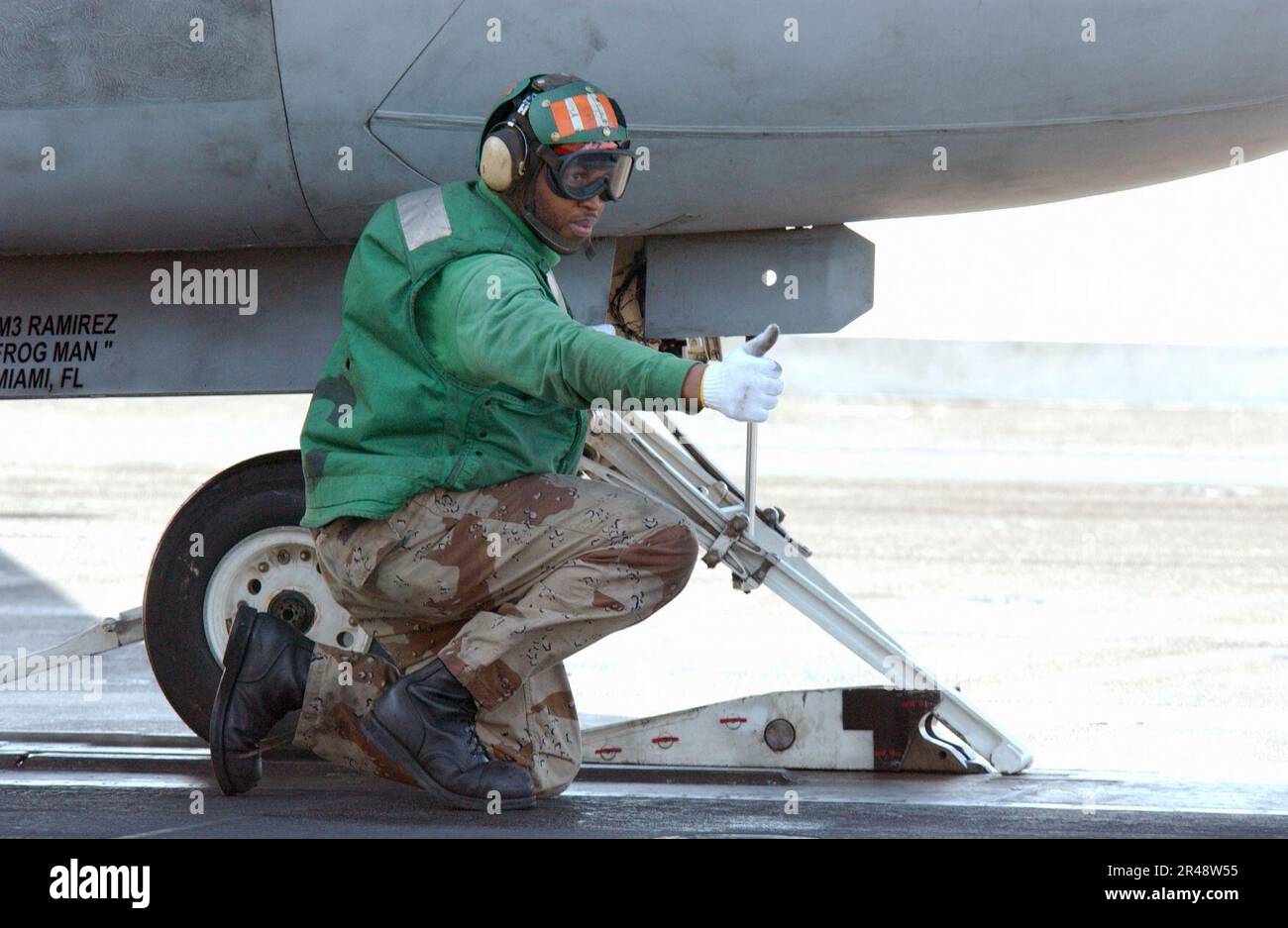US Navy A ''final checker'' lines up the launch bar on an EA-6B Prowler ...