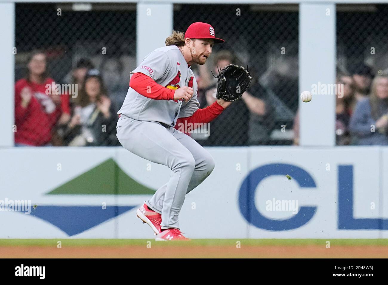 St. Louis Cardinals right fielder Brendan Donovan fields a ball hit for ...