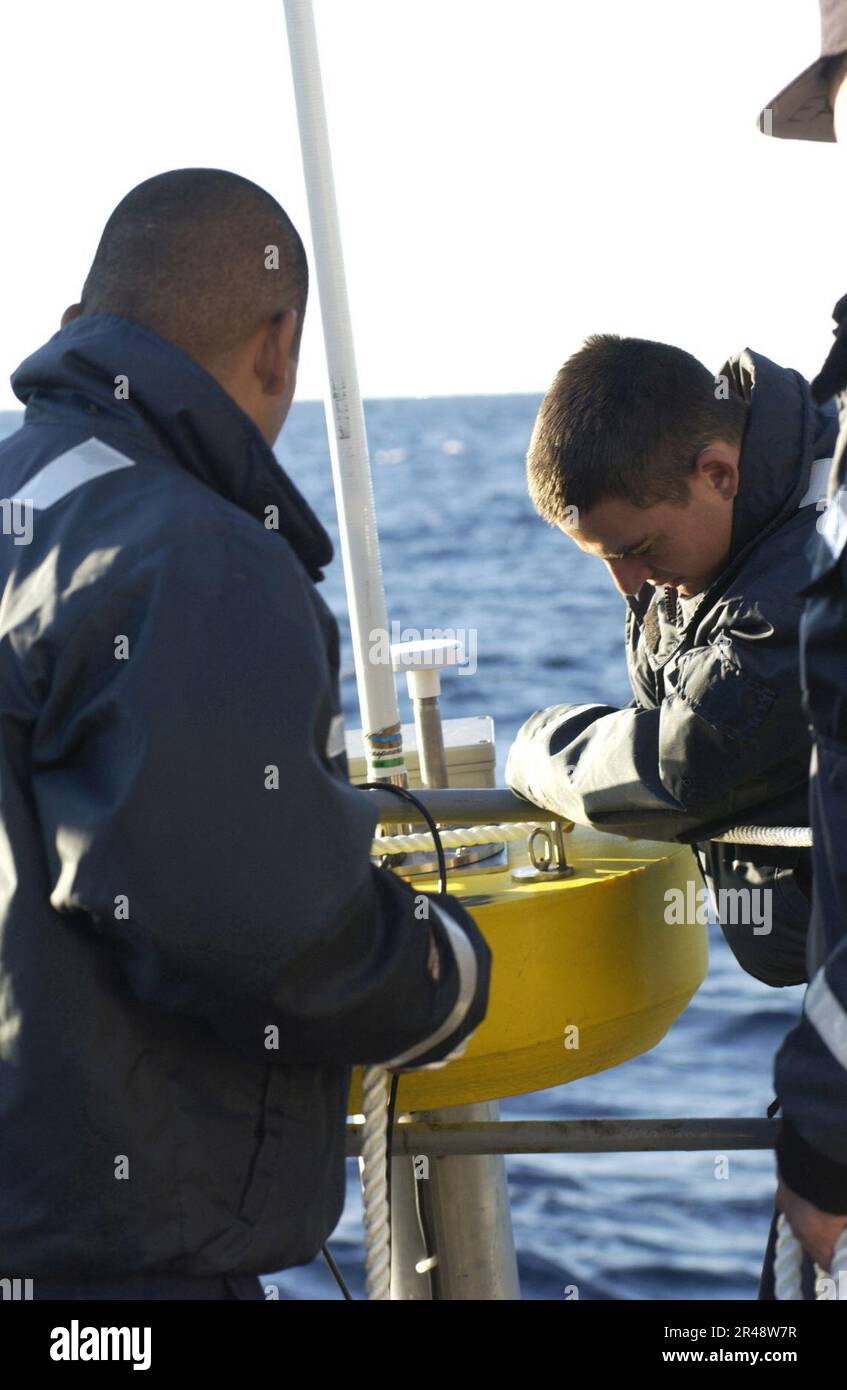 US Navy Sailors deploy probes used during testing of the Integrated ...