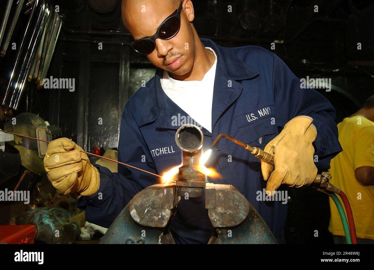 US Navy braising a fitting in the ship's pipe shop Stock Photo - Alamy