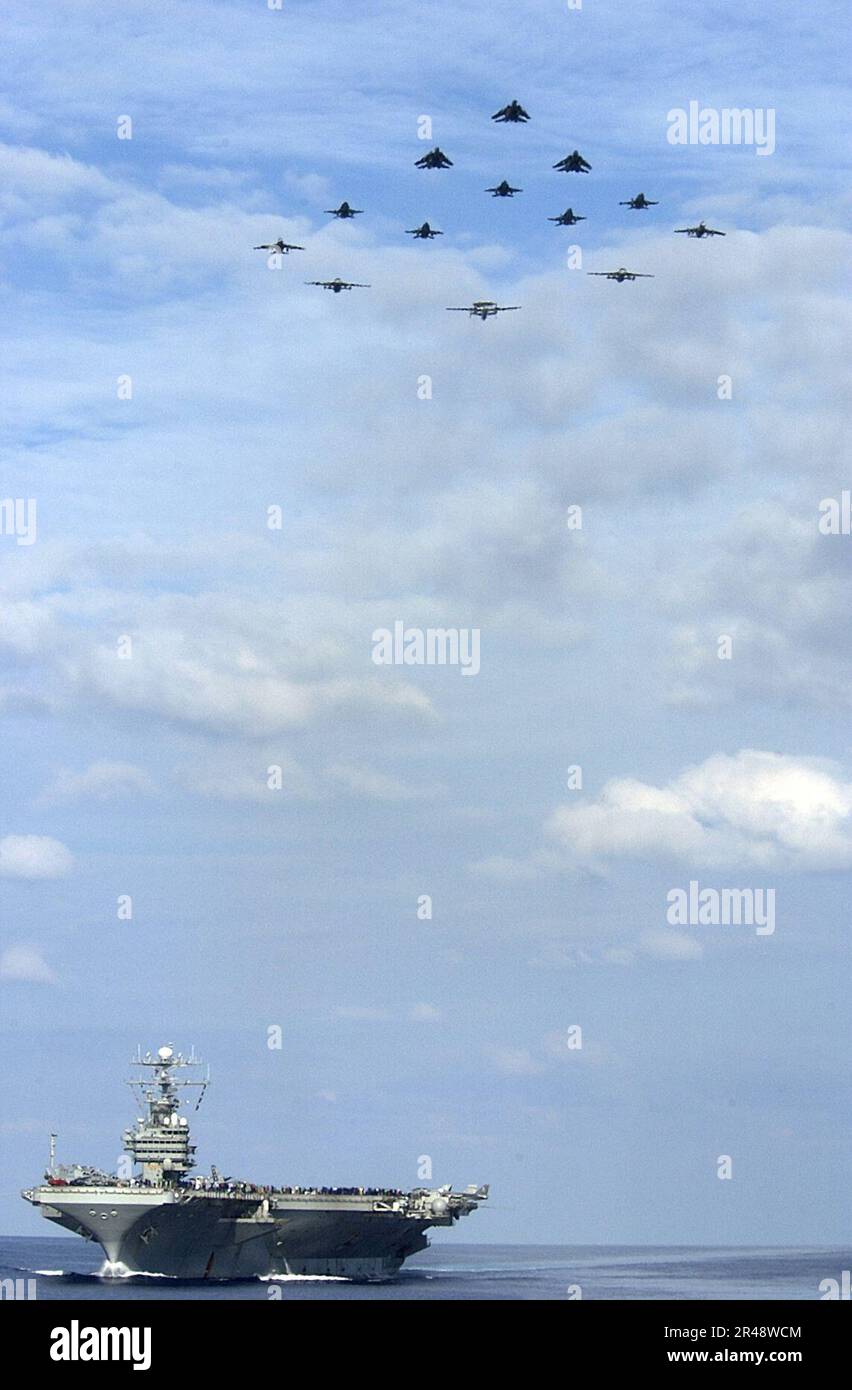 US Navy Aircraft aboard USS George Washington, execute a formation fly ...