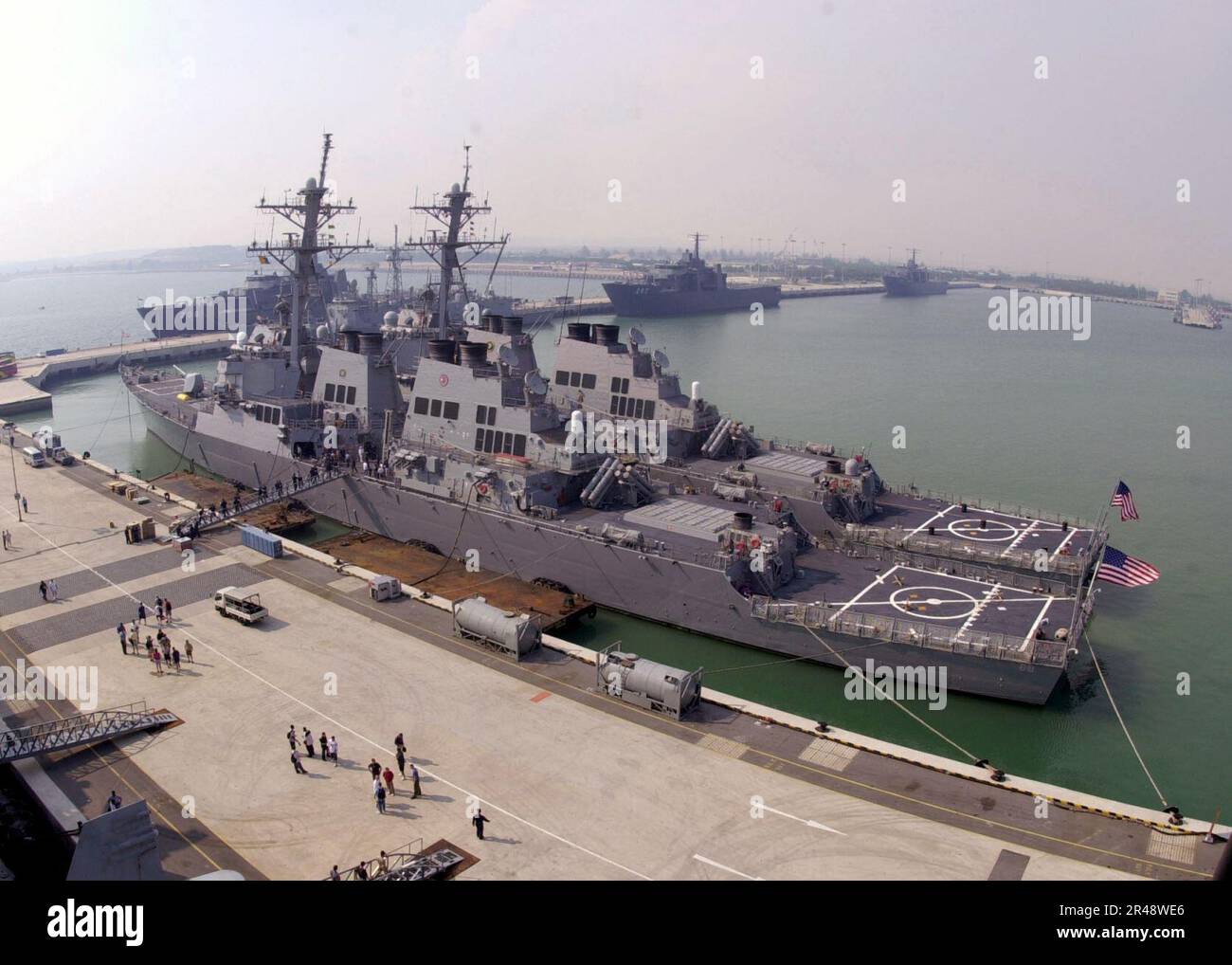US Navy USS Milius (DDG 69) (left) and USS Higgins (DDG 76) sit moored ...
