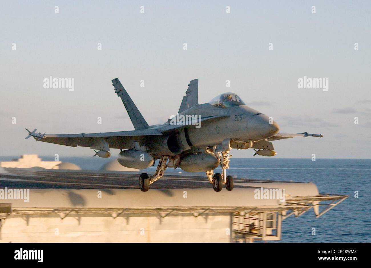 US Navy F-A-18C Hornet launches from one of four steam powered ...