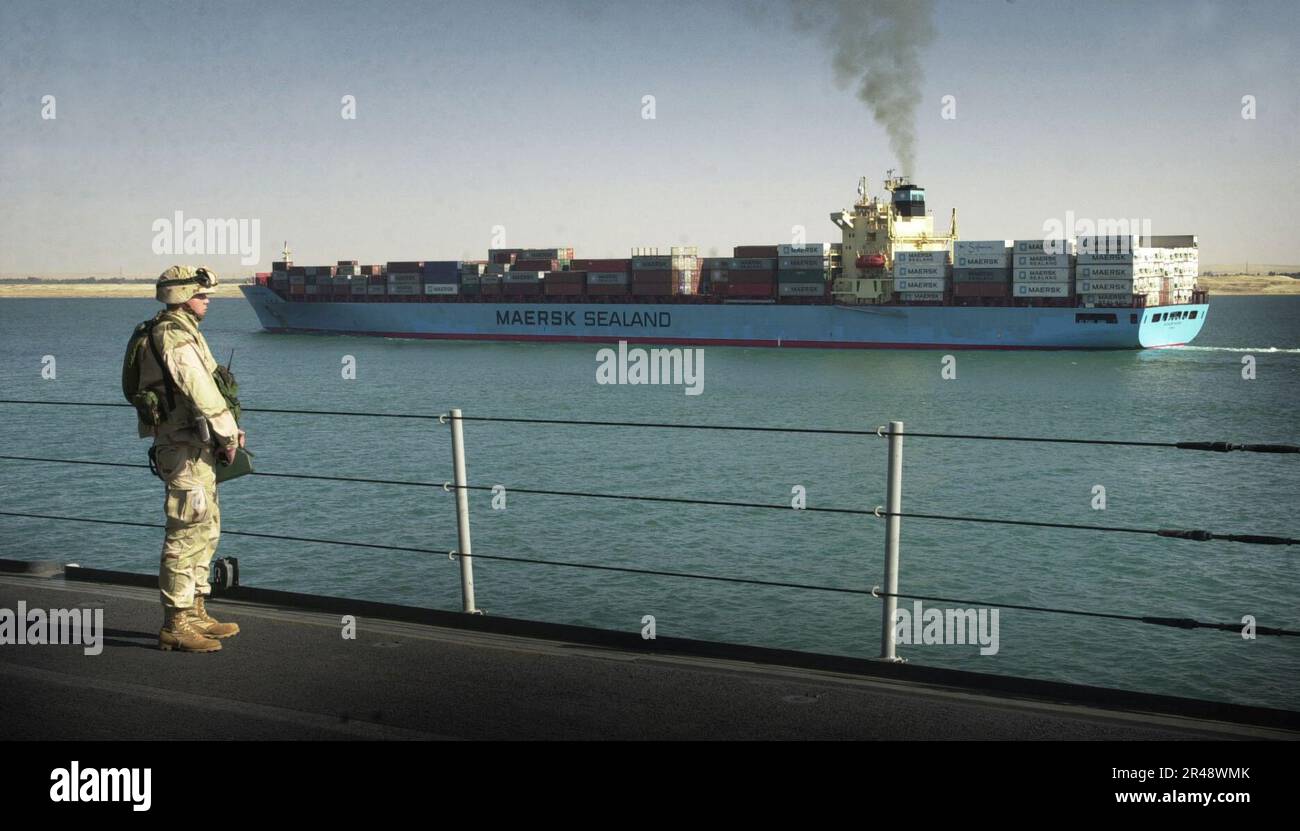 US Navy A U.S. Marine stands watch on the main deck aboard USS Mount ...