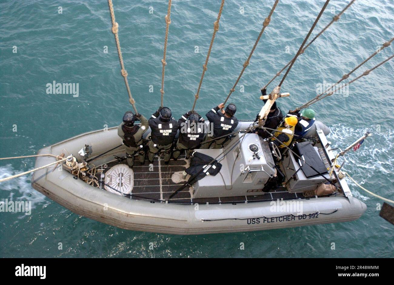 US Navy Sailors attached to the U.S. Coast Guard's Tactical Law ...