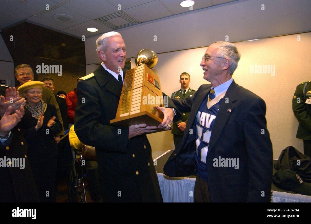 US Navy Midshipman receive the Secretary's Trophy after beating Army 59 ...