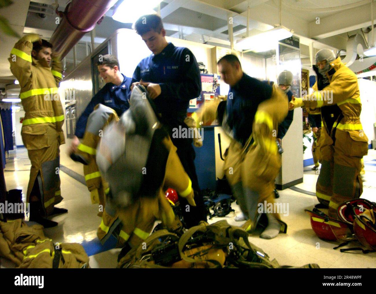 US Navy Fire-team members don their battle dress Stock Photo - Alamy