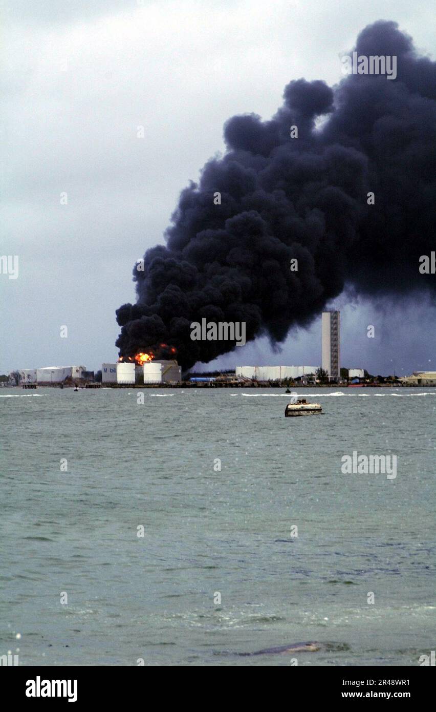 US Navy Heavy smoke rises from a fuel depot aboard U.S. Naval Forces ...