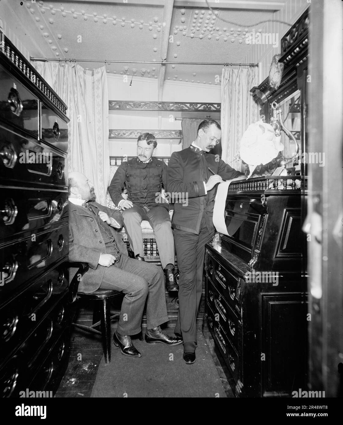 U.S.S. Maine, paymaster's room, 1896 Stock Photo - Alamy