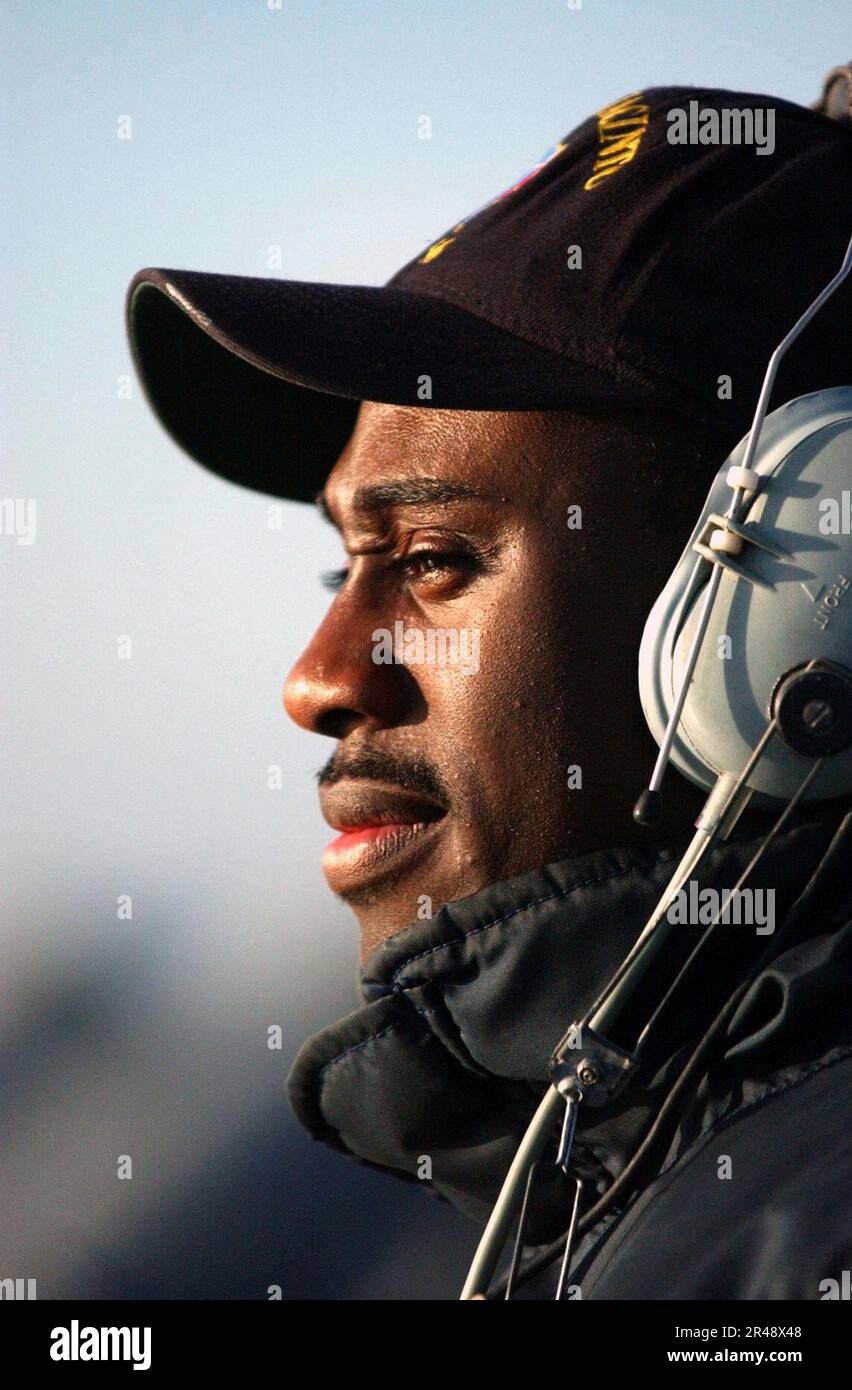 US Navy Seamen Anthony W. Hinton, assigned to the Deck Division of the ...