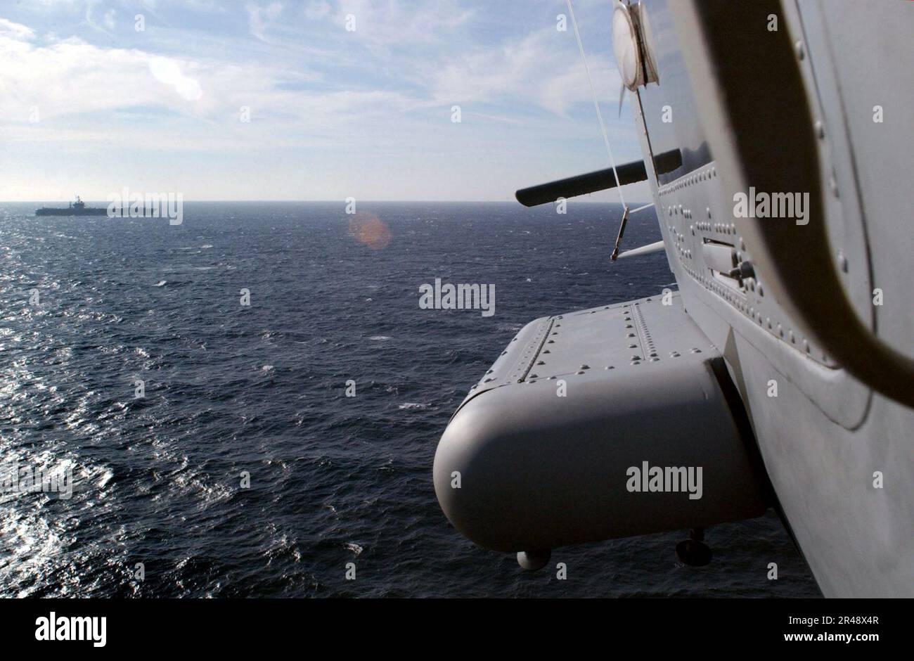 US Navy rear view from an SH-60 showing USS Harry S. Truman (CVN 75) on ...