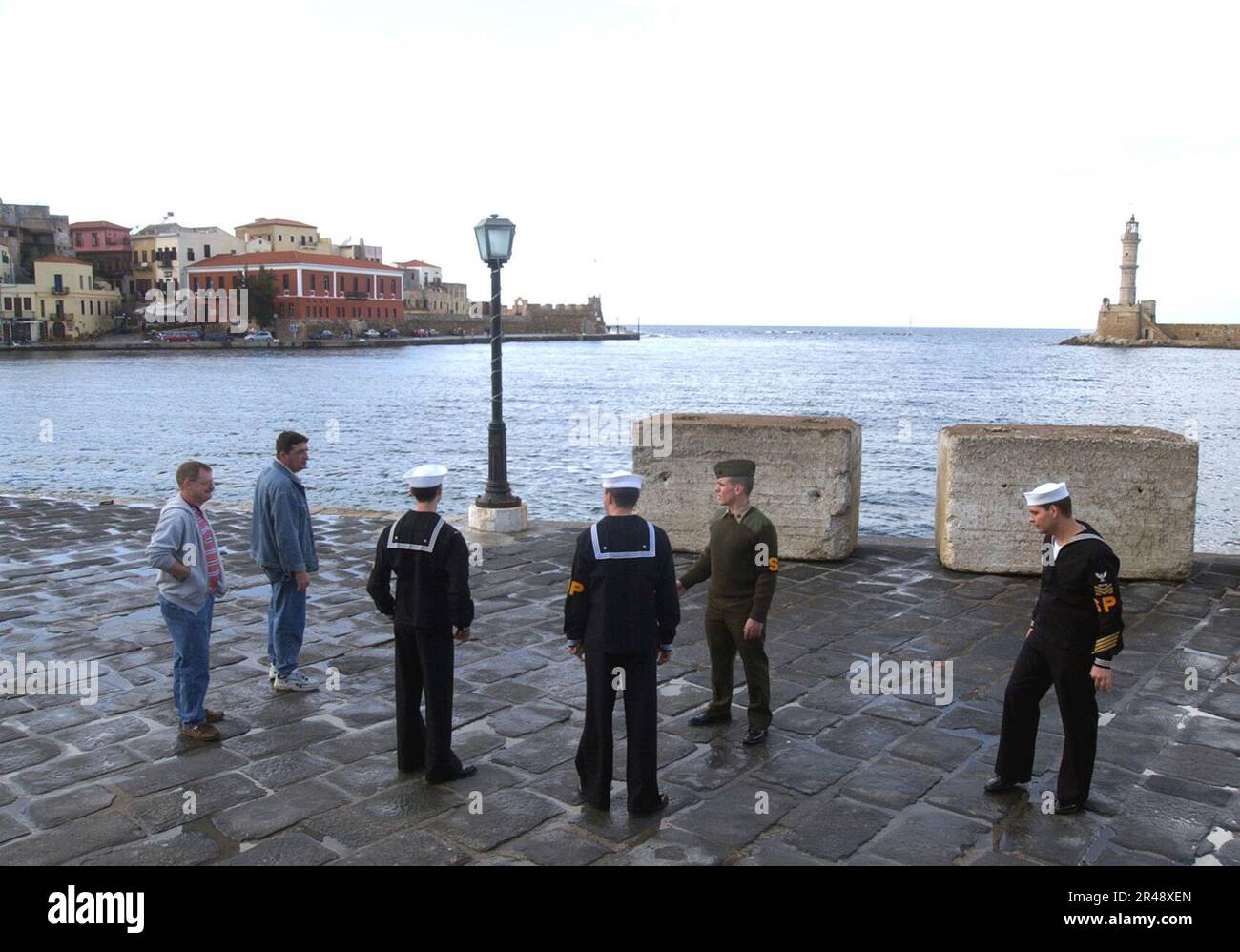US Navy Shore Patrol talk with Sailors Stock Photo - Alamy