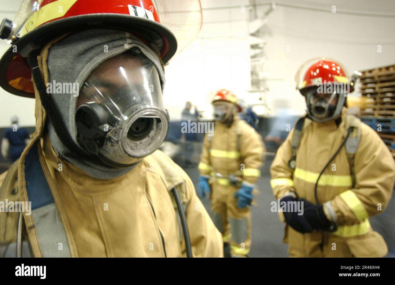 US Navy Sailors prepare to conduct a training exercise, designed to ...