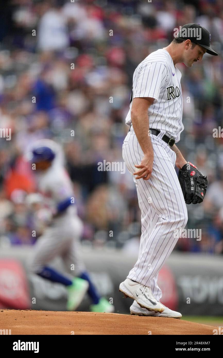 Colorado Rockies starting pitcher Connor Seabold, front, reacts after ...