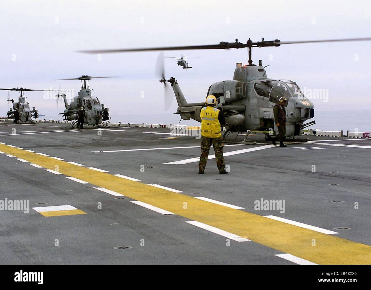 US Navy Cobra helicopters from Helicopter Light Attack Squadron Two Six ...