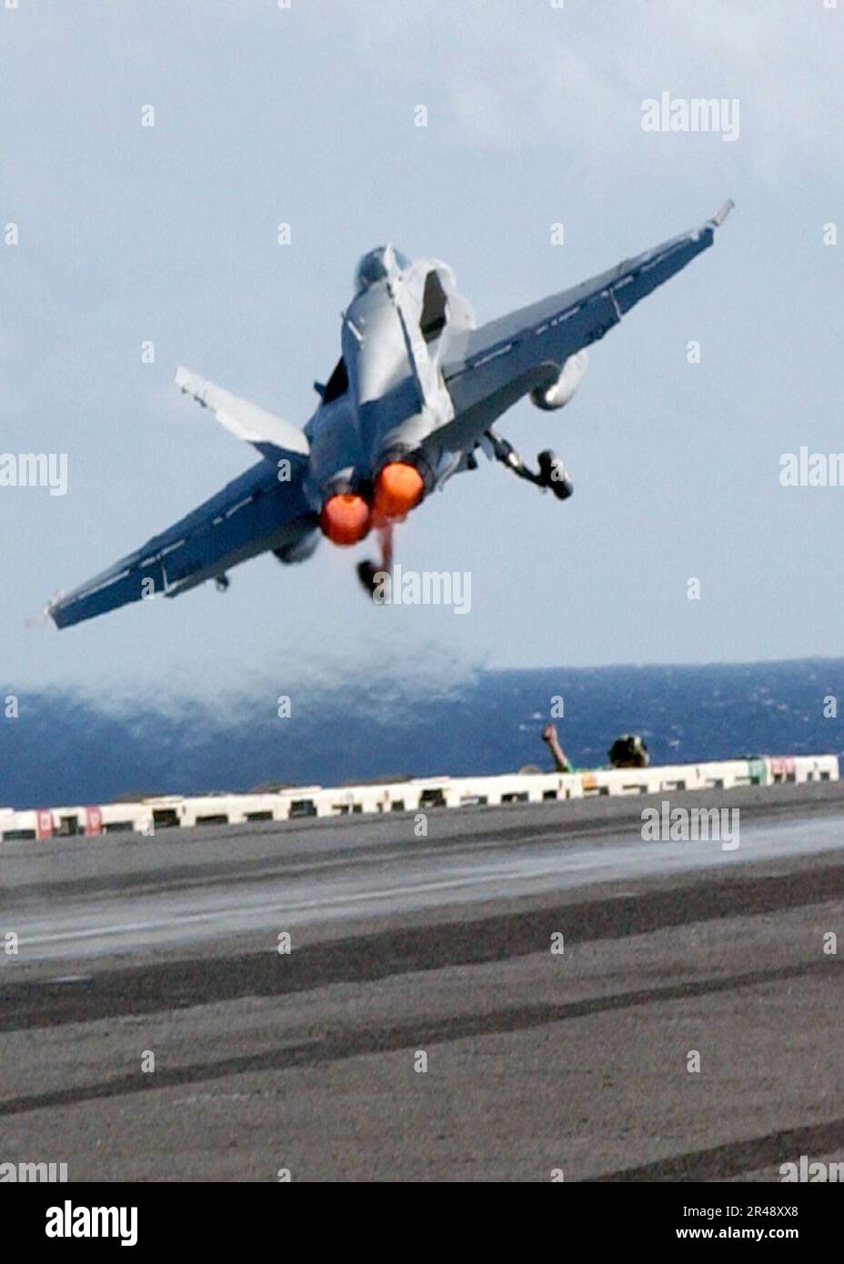 US Navy Hornet launches from one of four steam powered catapults on the ...
