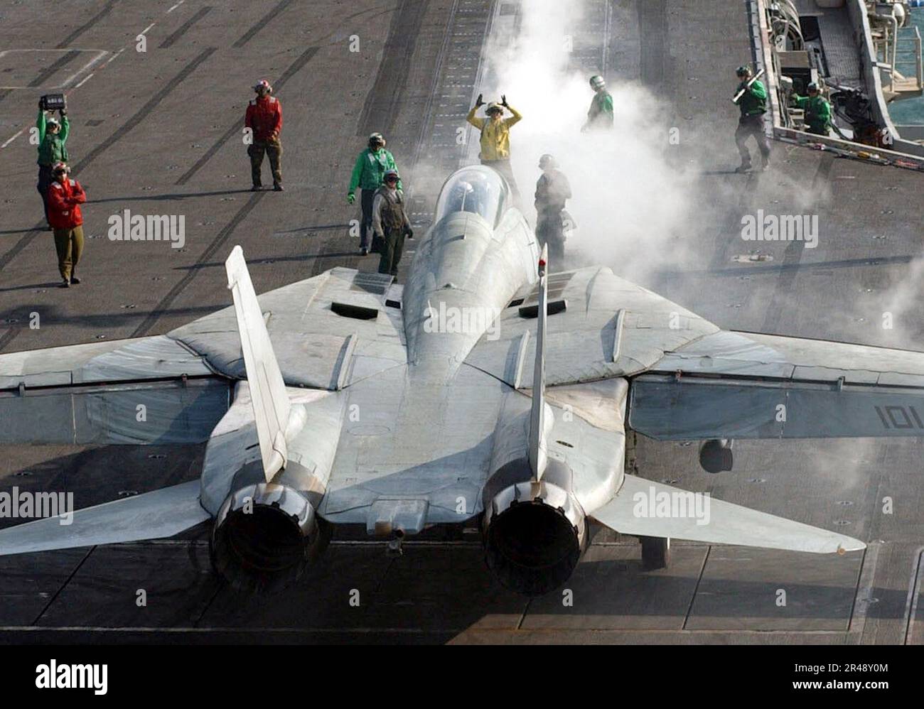 US Navy Tomcat prepares to launch from one of four steam catapults ...
