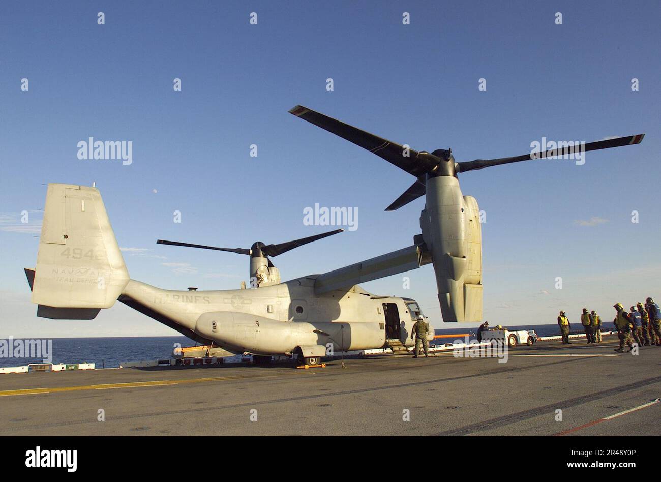 US Navy Osprey stands ready on the ship's flight deck, as tests resumed ...