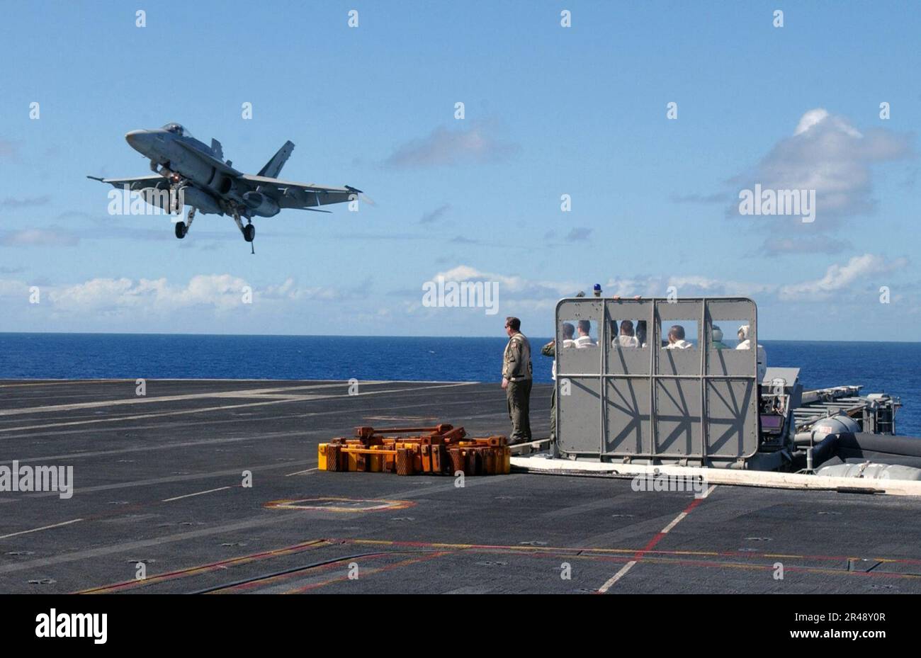 US Navy An F-A-18 Hornet assigned to the Hunters of Strike Fighter ...
