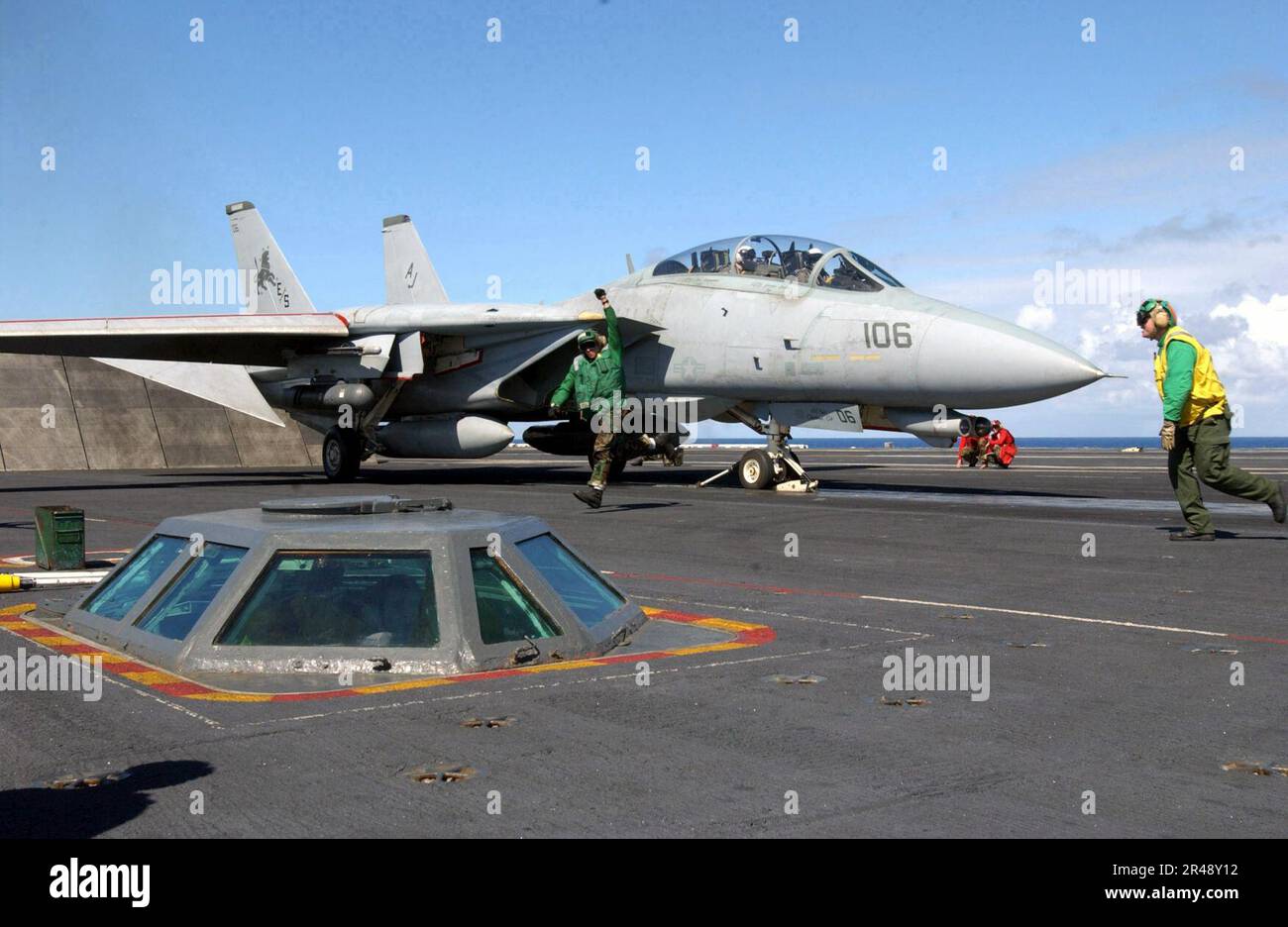 US Navy An F-14 Tomcat makes ready for a catapult launch Stock Photo ...