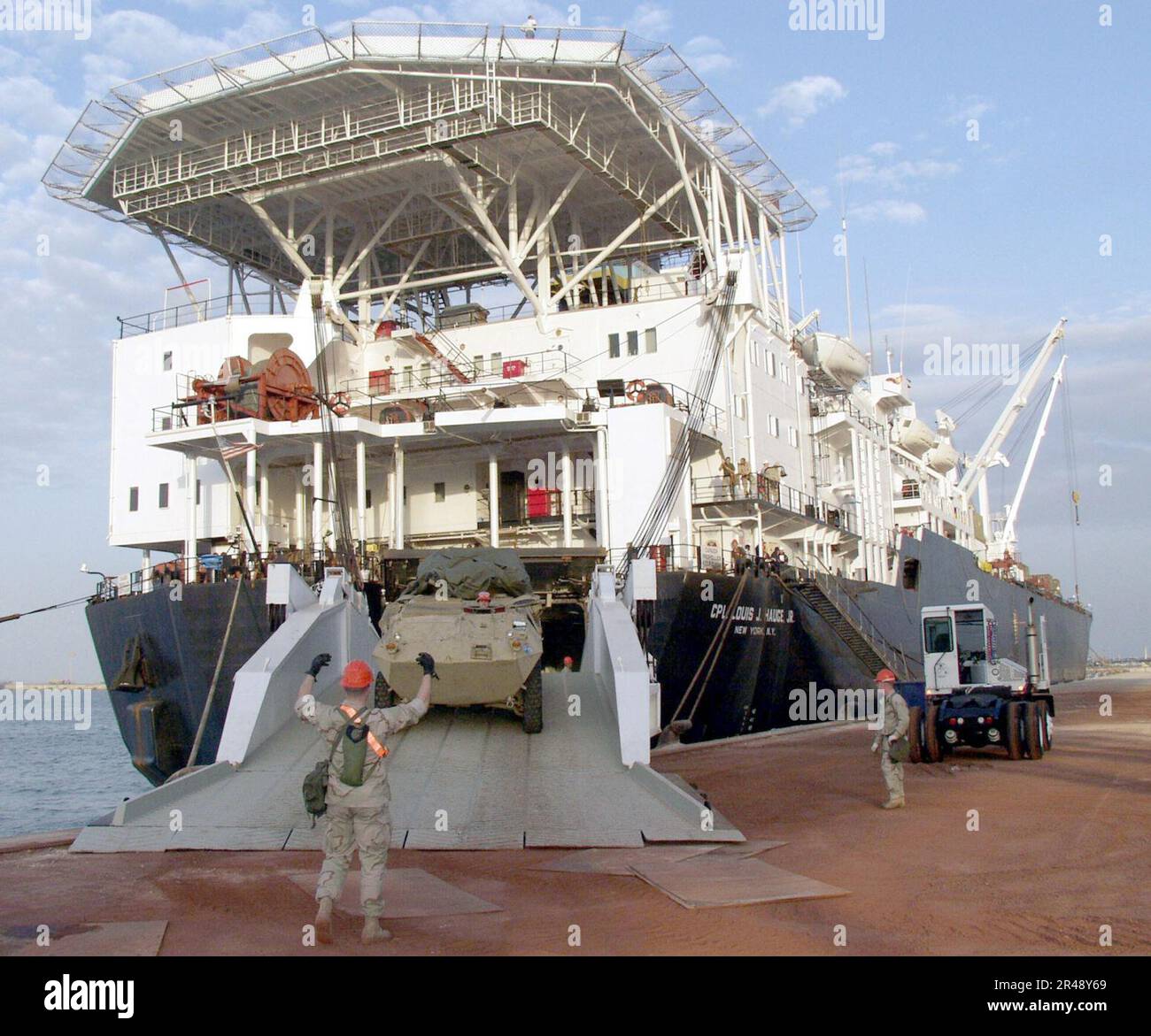 US Navy A U.S. Marine guides a Light Armored Reconnaissance Craft down ...