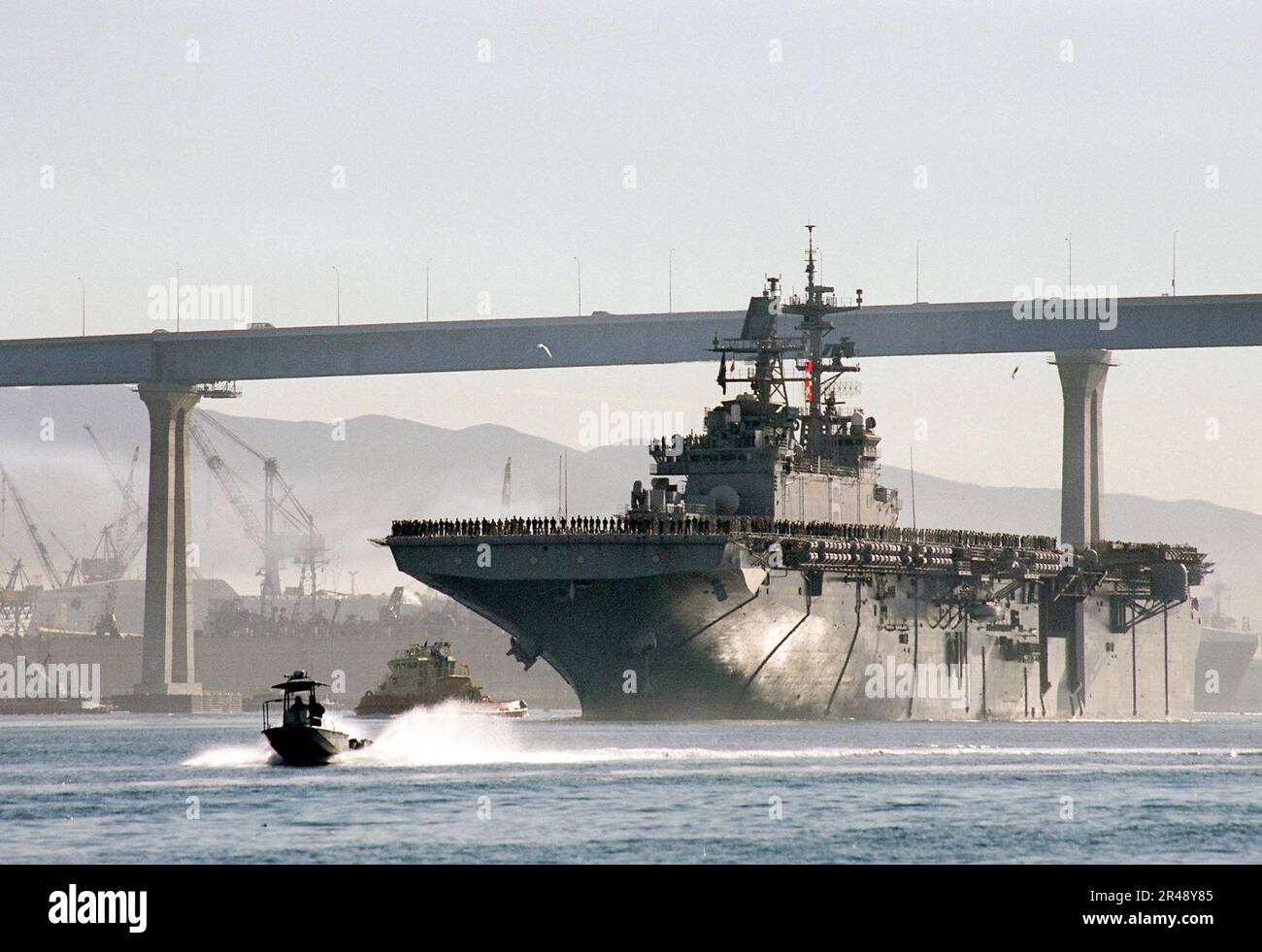 US Navy The amphibious assault ship passes under the Coronado bridge as ...