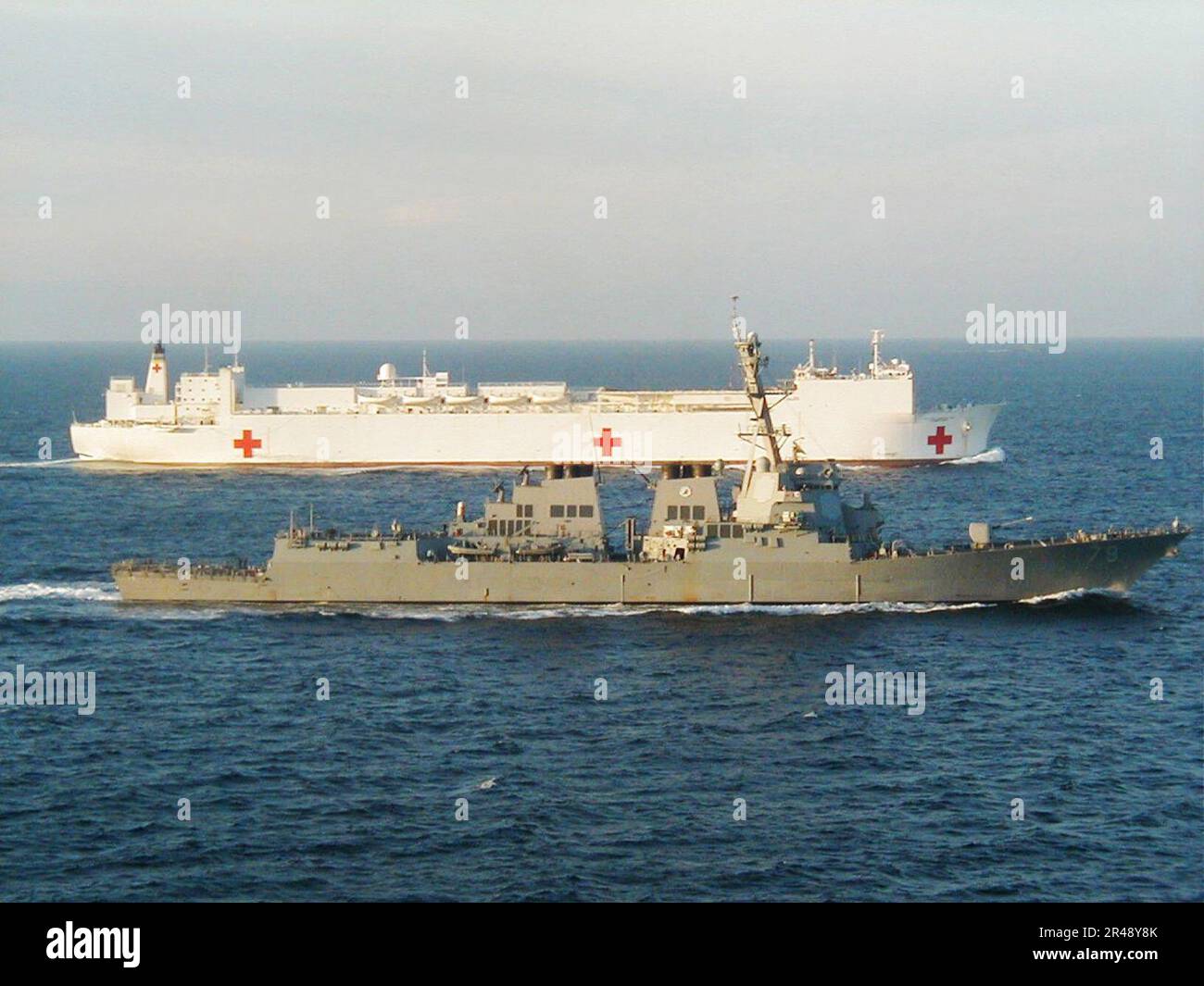 US Navy The guided missile destroyer USS Oscar Austin (DDG 79) escorts ...