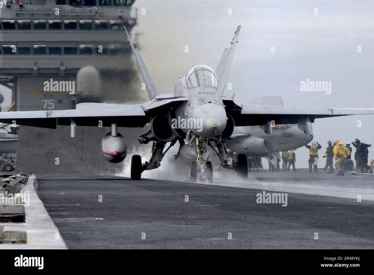 US Navy An F-A-18 Hornet strike fighter launches from catapult one on ...