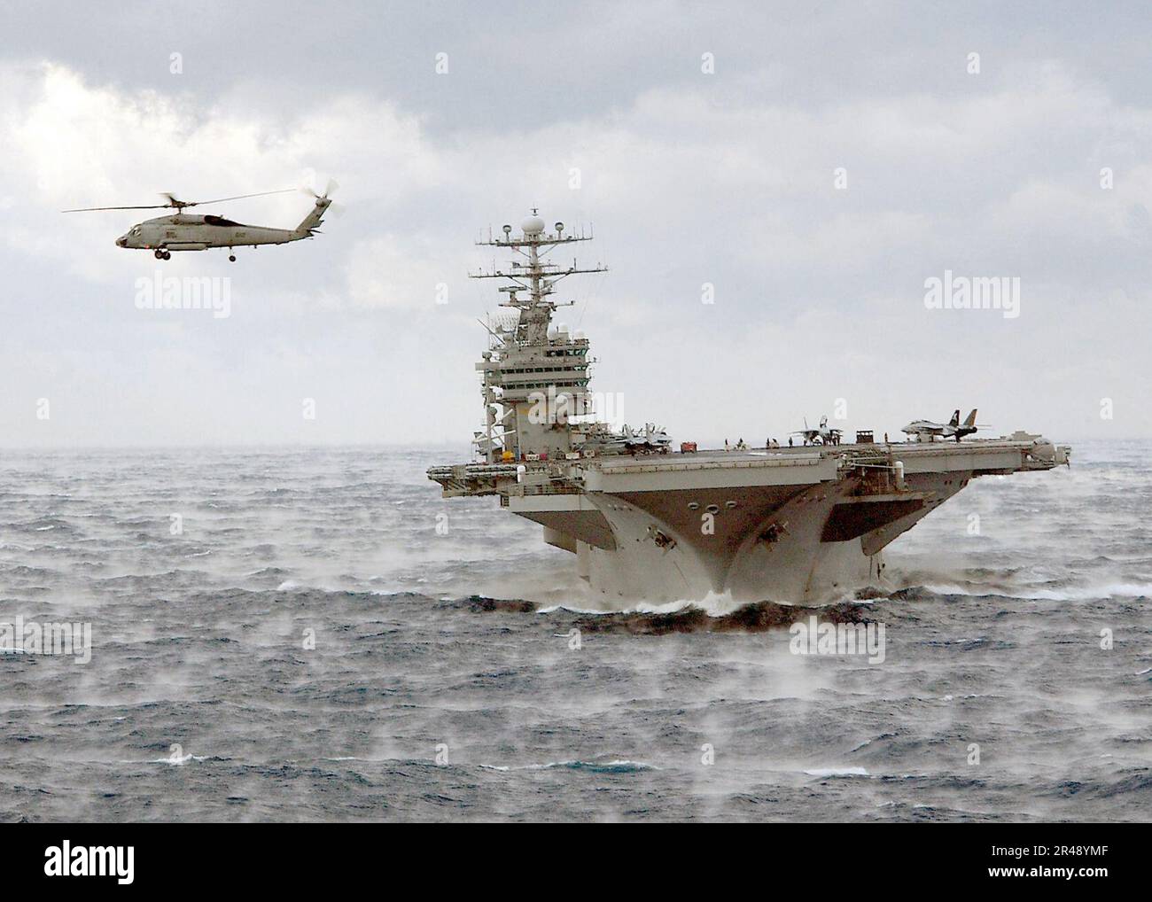 US Navy Sea Hawk flies over the USS George Washington Stock Photo - Alamy