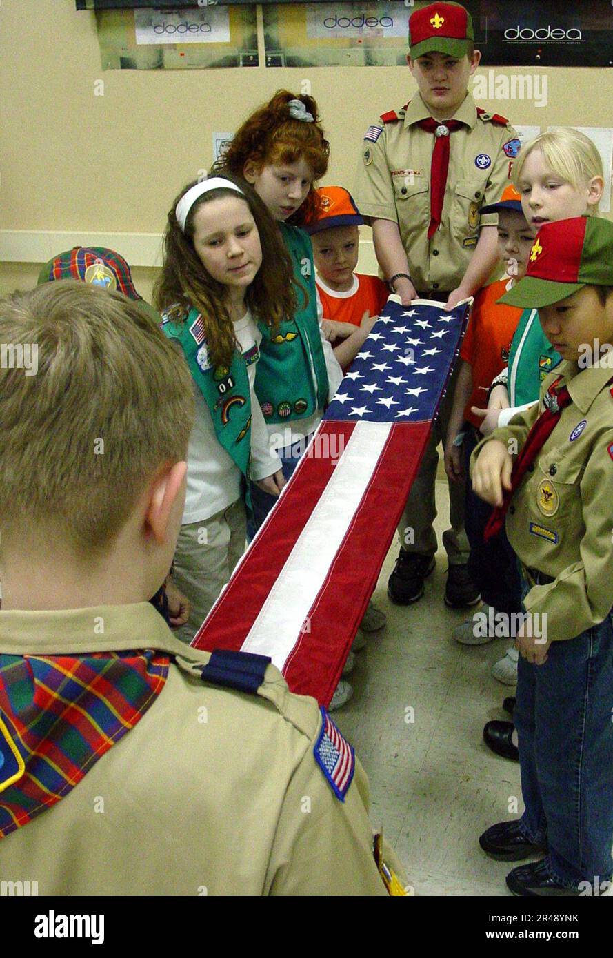 US Navy Boy Scouts, Girl Scouts and Cub Scouts took part in a flag ...