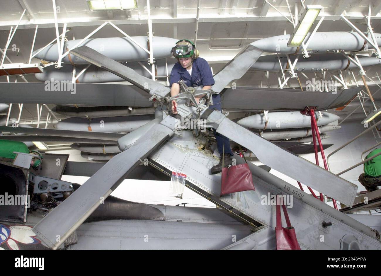 US Navy a tail rotor inspection of the elastomeric bearings located in ...