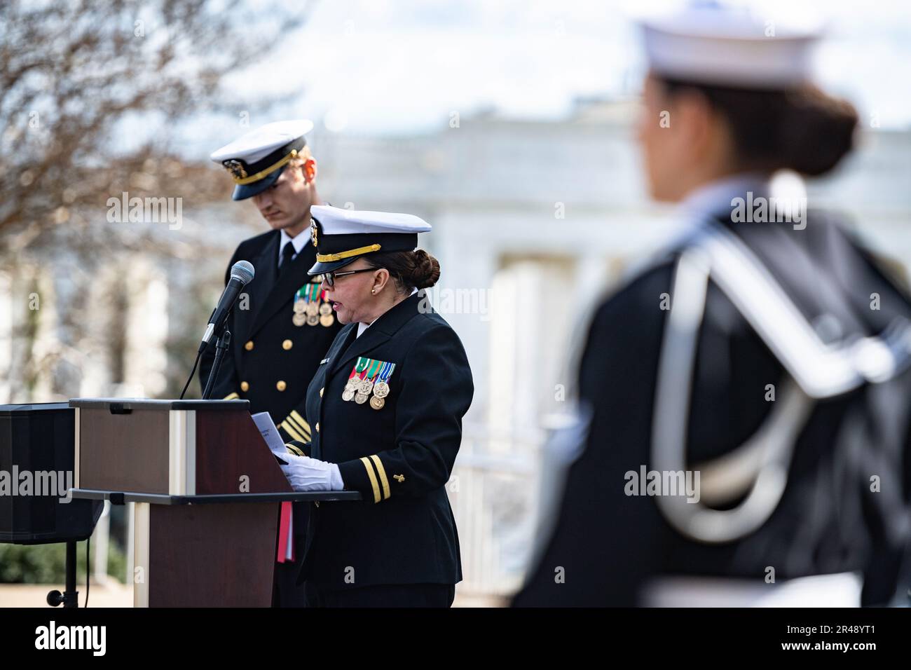 U.S. Navy Chaplain (Lt.) Regina Johnson offers the invocation during a ...