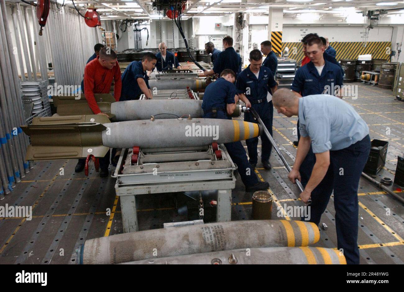 US Navy Aviation Ordnancemen assemble a 500-pound GBU-12 bomb Stock ...