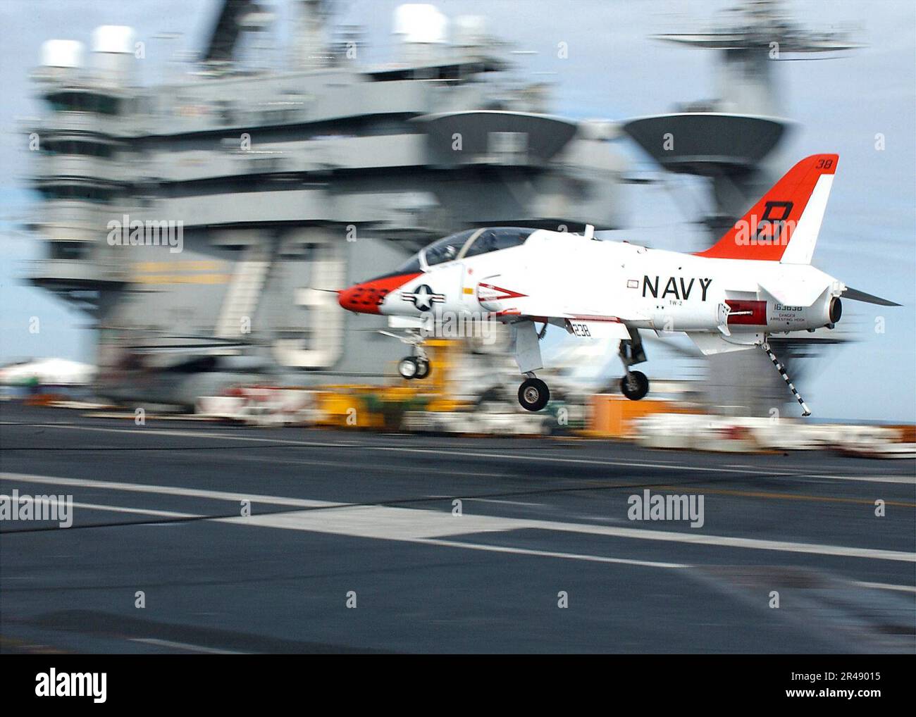 US Navy A T-45A Goshawk makes a final approach with tail hook down ...