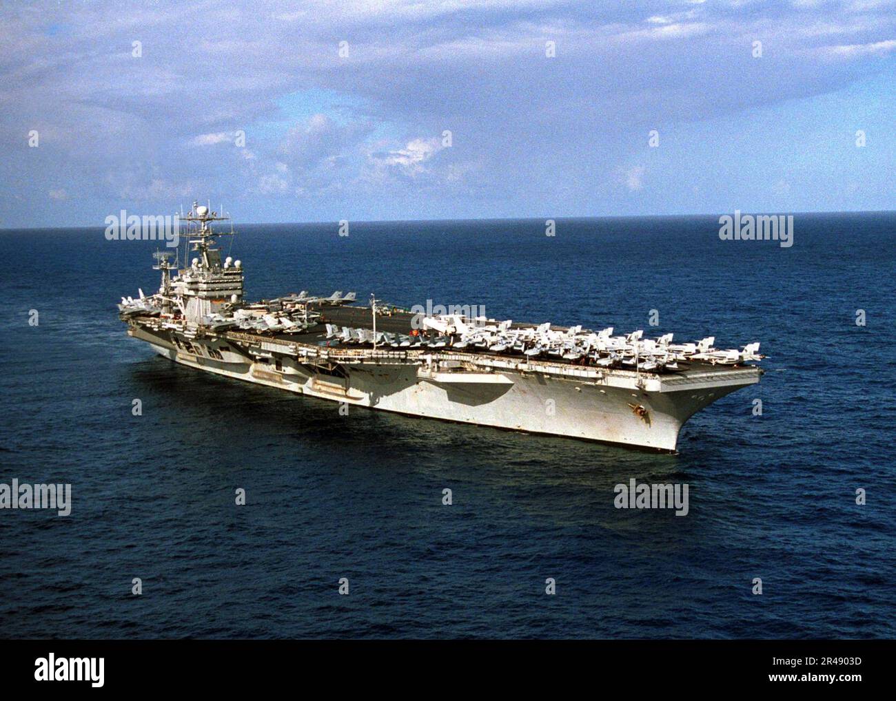 US Navy Aerial view of the nuclear powered aircraft carrier Theodore Roosevelt with her embarked ...