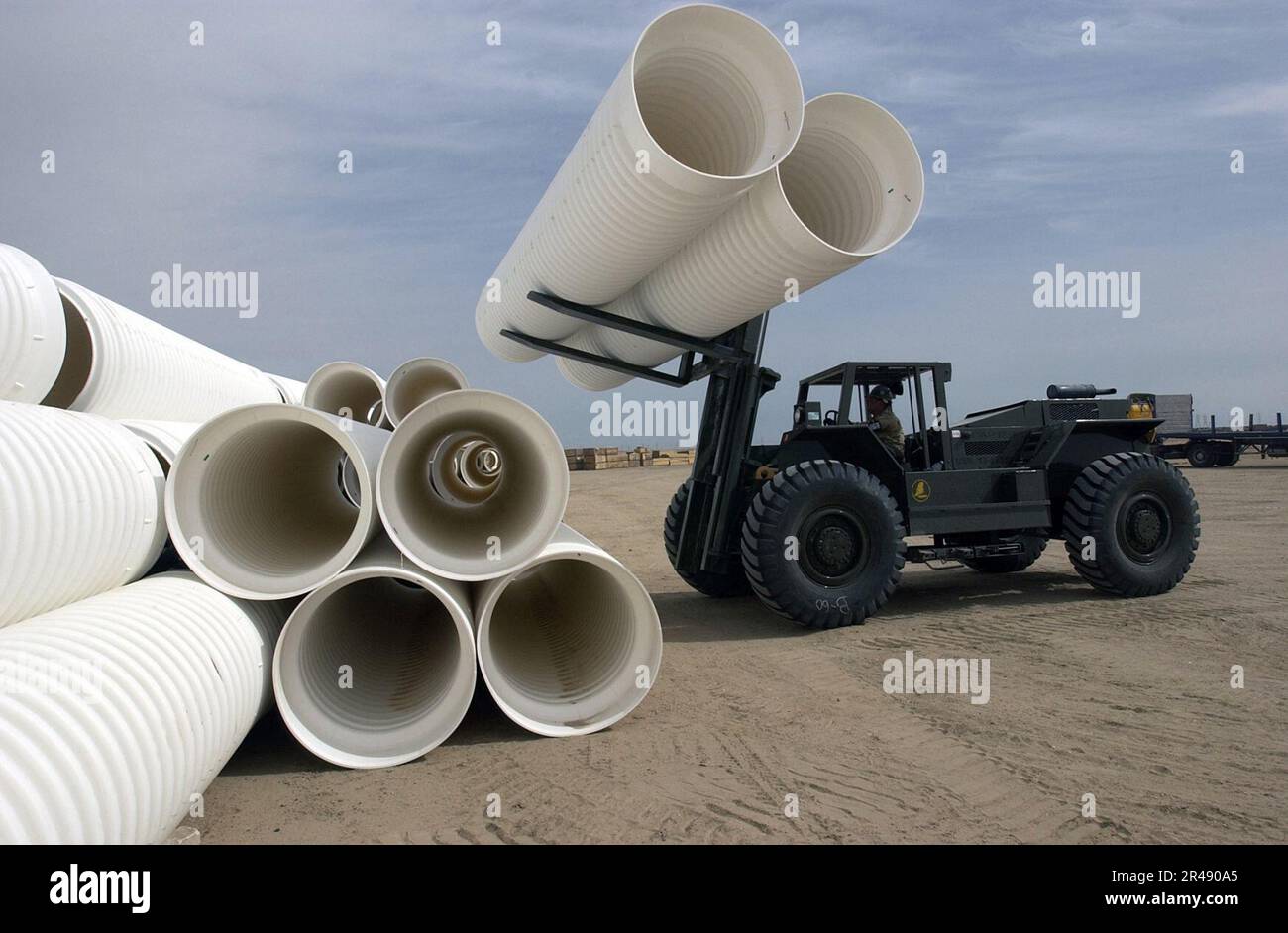 US Navy Seabees assigned to Naval Mobile Construction Battalion Seventy ...