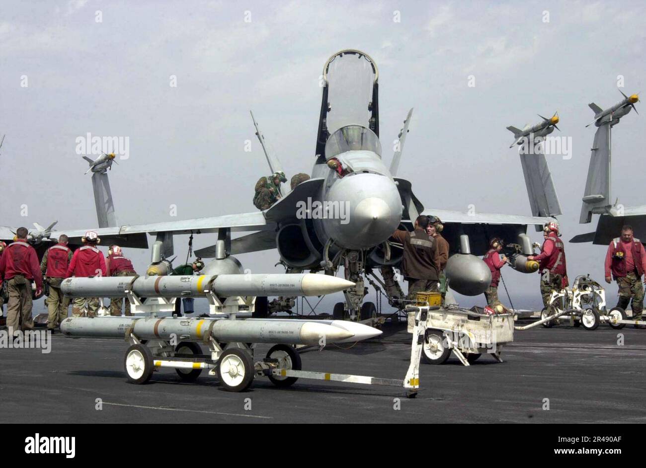 US Navy A bomb cart of Advanced Medium Range Air to Air Missiles sits ...