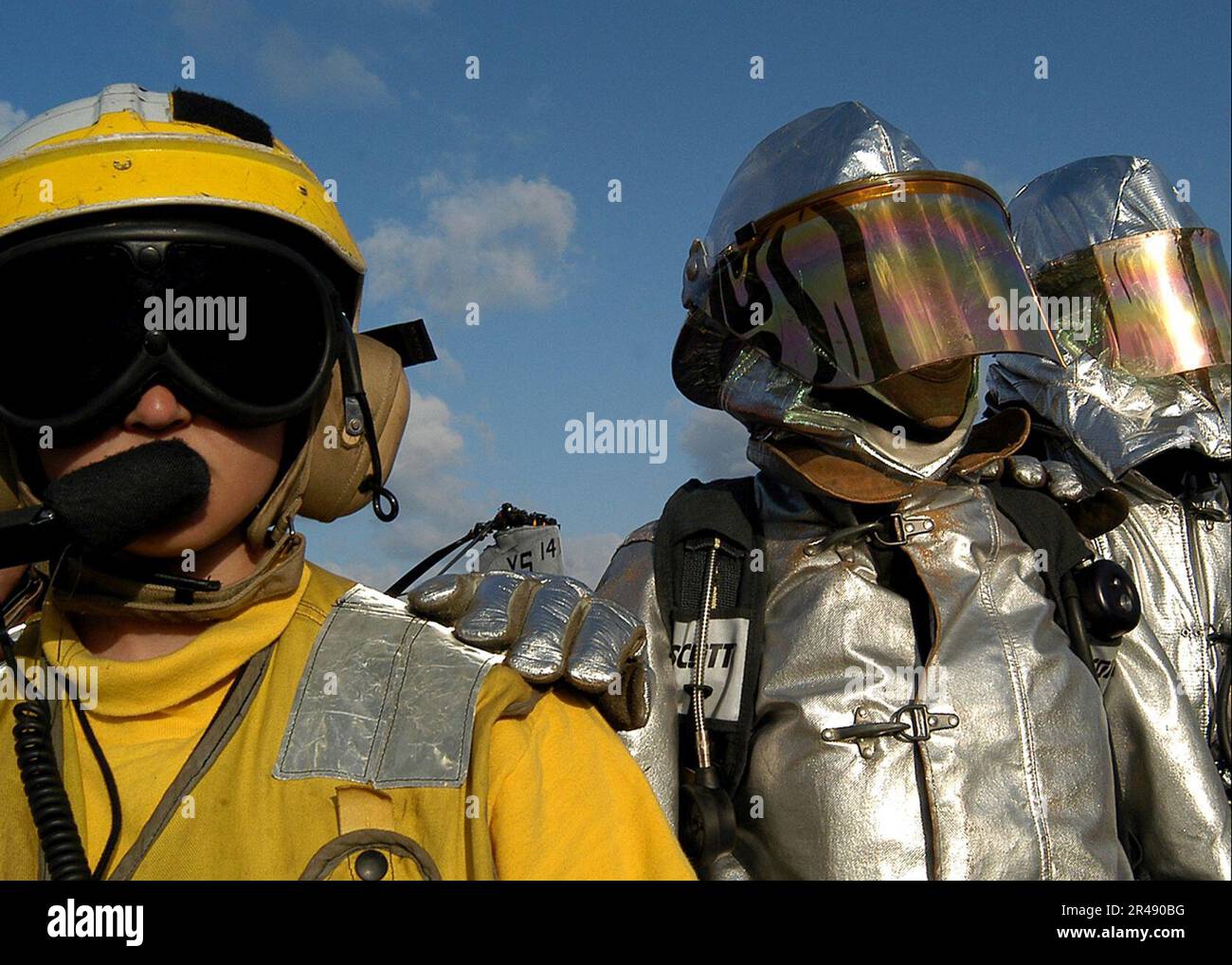 US Navy Sailors assigned to the Crash and Salvage Team conduct a flight ...