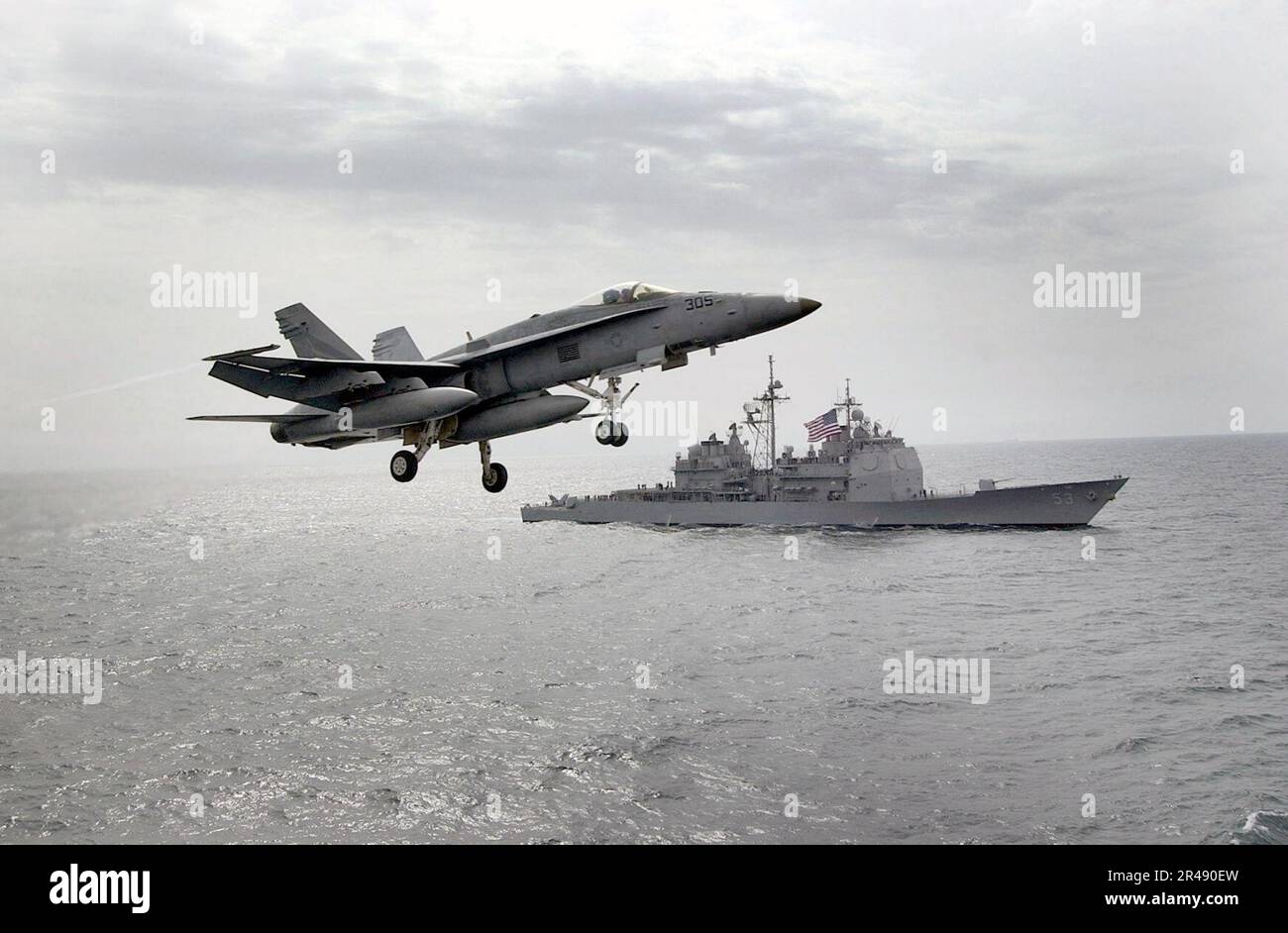 US Navy An F-A-18 Hornet assigned to the Vigilantes of Strike Fighter ...